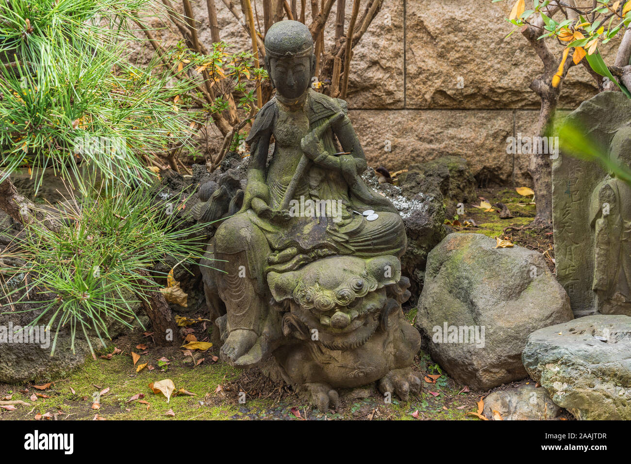 Stone statues of the sixteen arhats of Zen Buddhism with commemorative ...