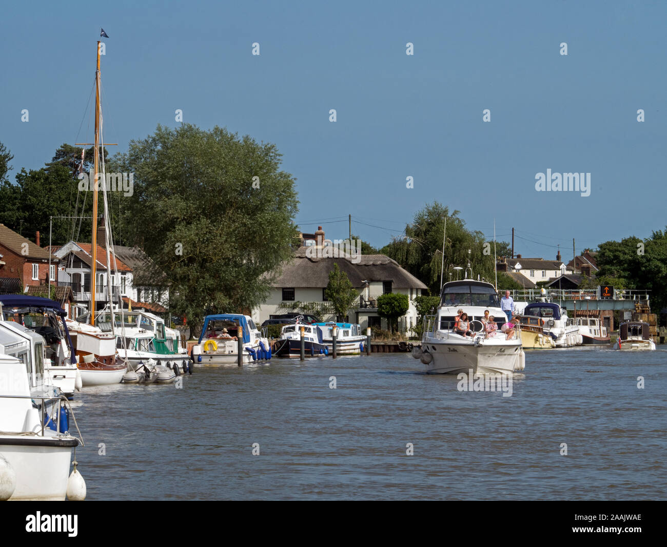 Boating on the River Yare, part of The Norfolk Broads National Park, at ...