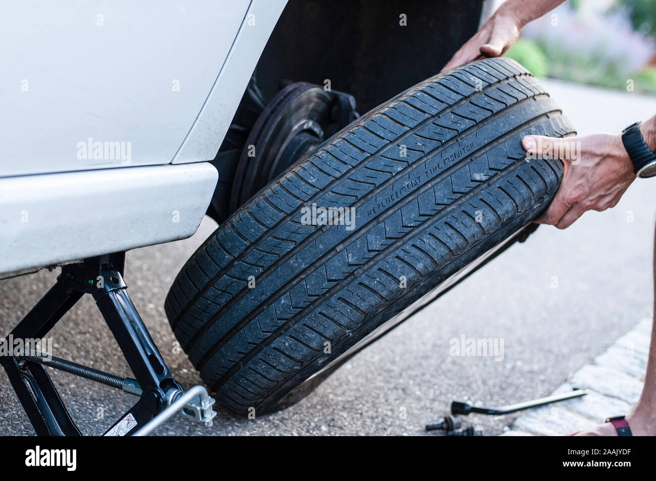 Car punctured hi-res stock photography and images - Alamy