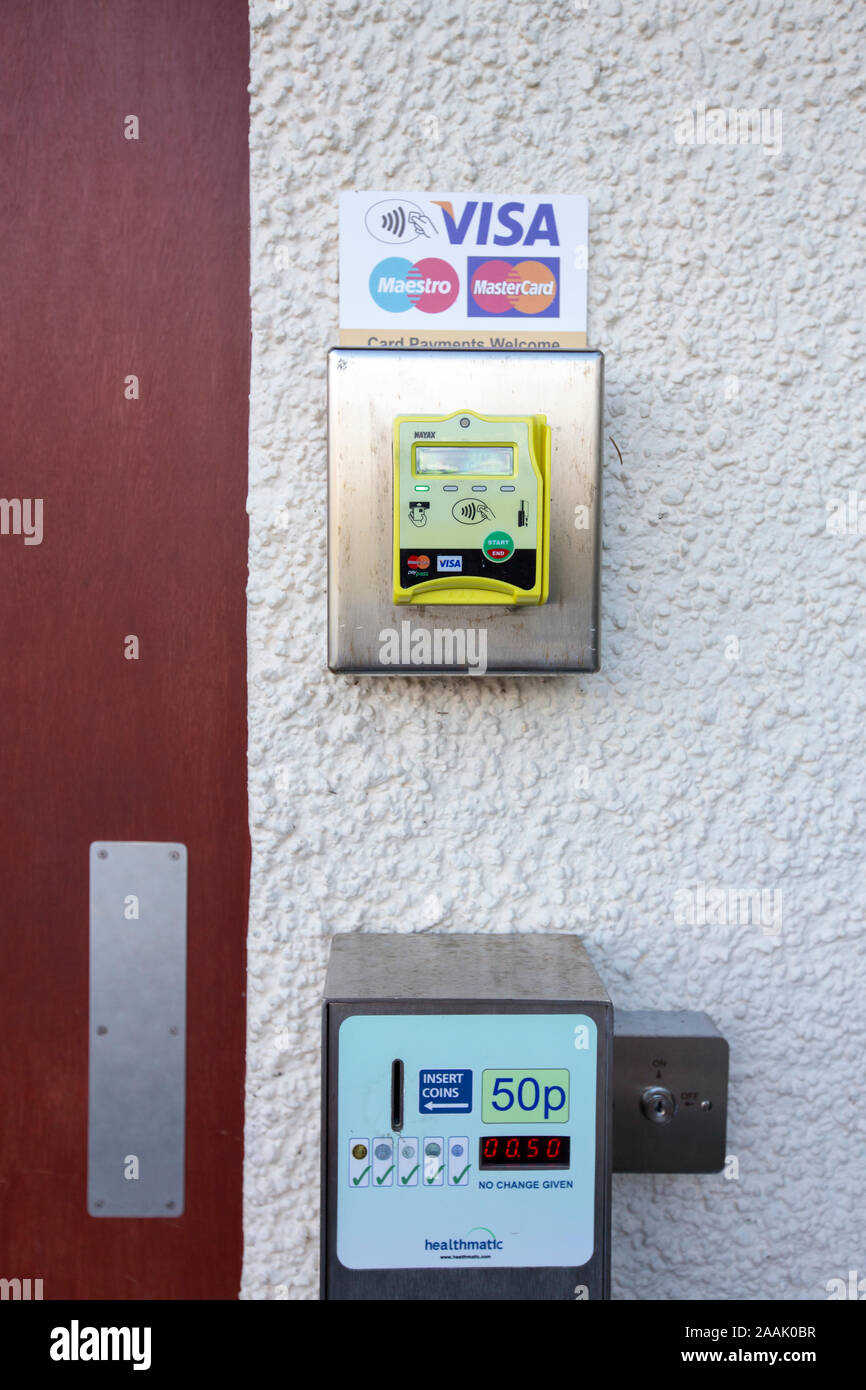 A sign of the time,s a public toilet that takes credit card payment for ...