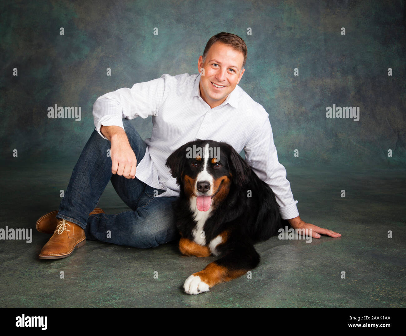 Man sitting dog hi-res stock photography and images - Alamy