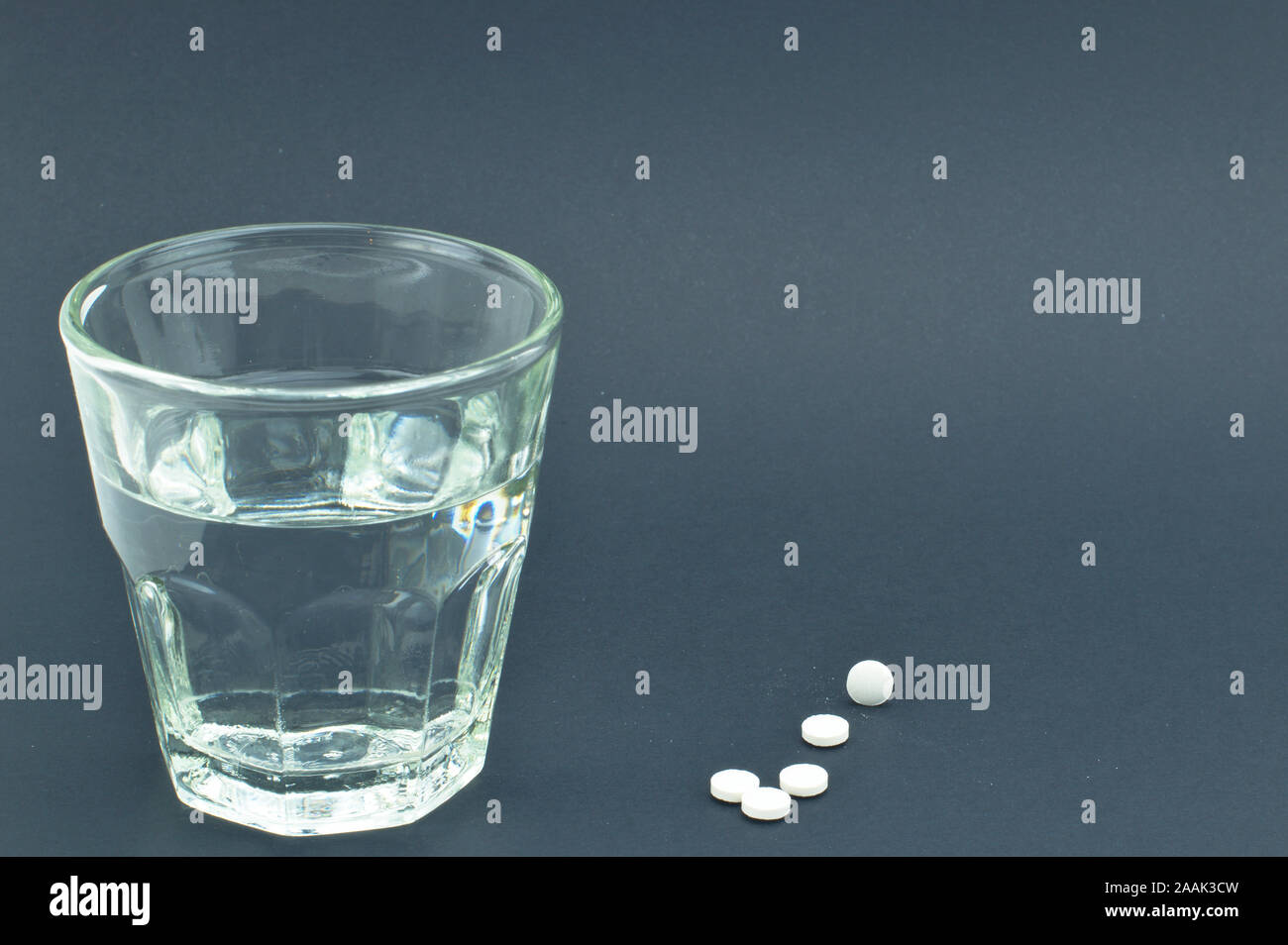 glass and medications Stock Photo - Alamy