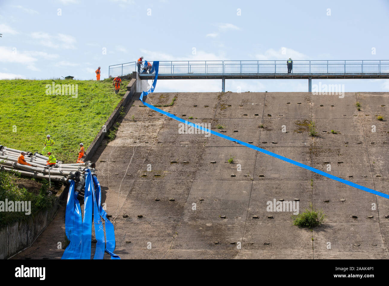 Pumping out water from Toddbrook Reservoir above Whaley Bridge in ...