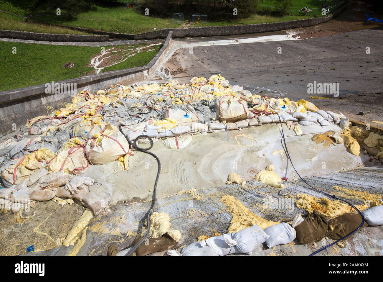 Pumping out water from Toddbrook Reservoir above Whaley Bridge in ...
