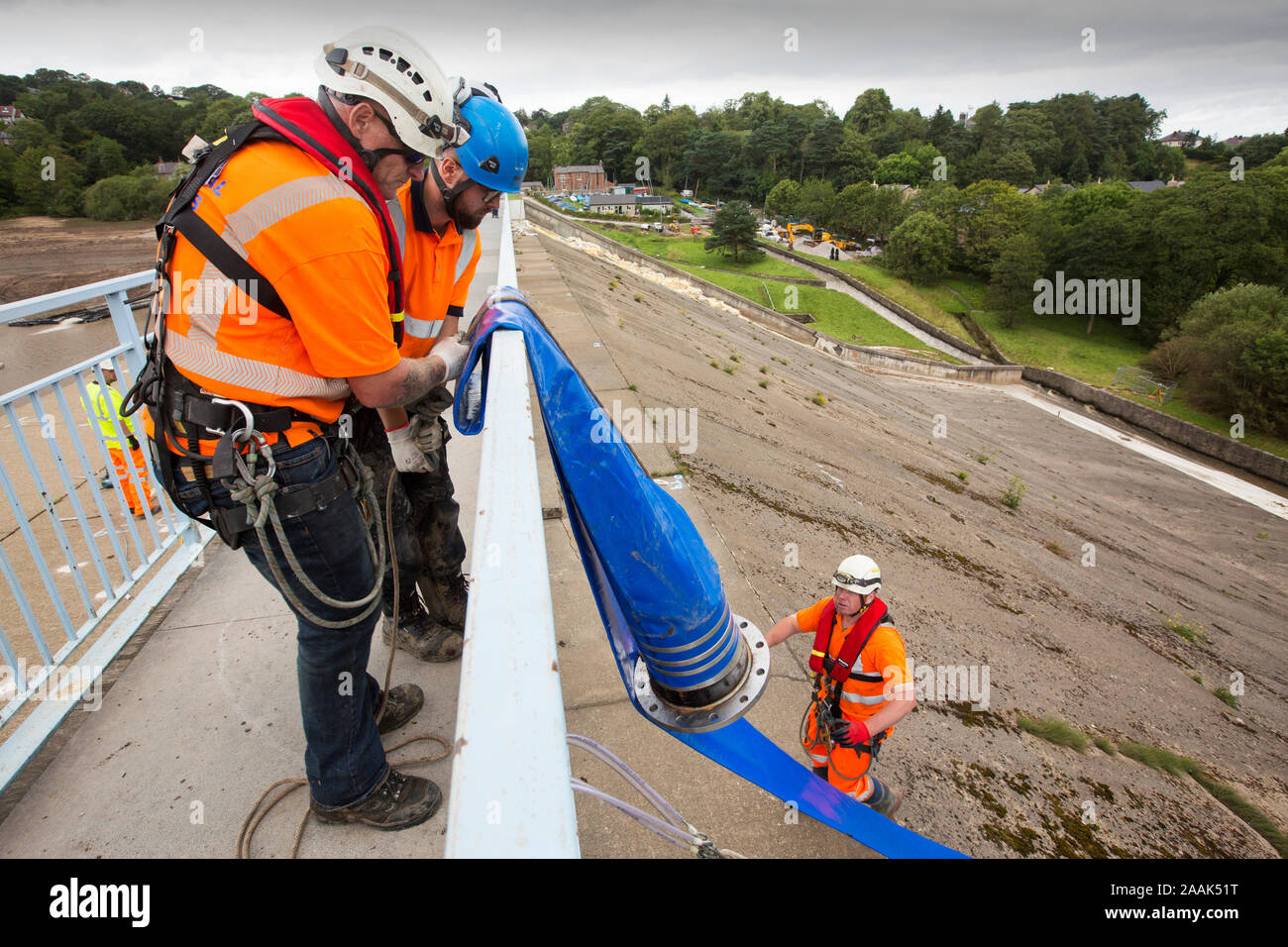 Pumping out water from Toddbrook Reservoir above Whaley Bridge in ...