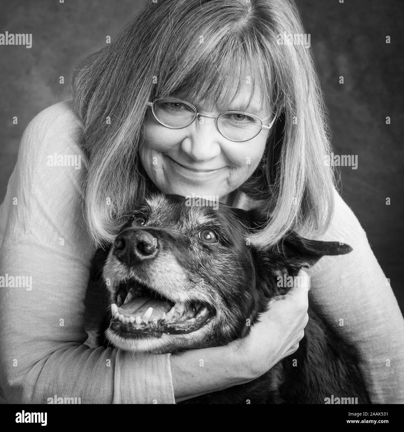Woman with black lab Black and White Stock Photos & Images - Alamy