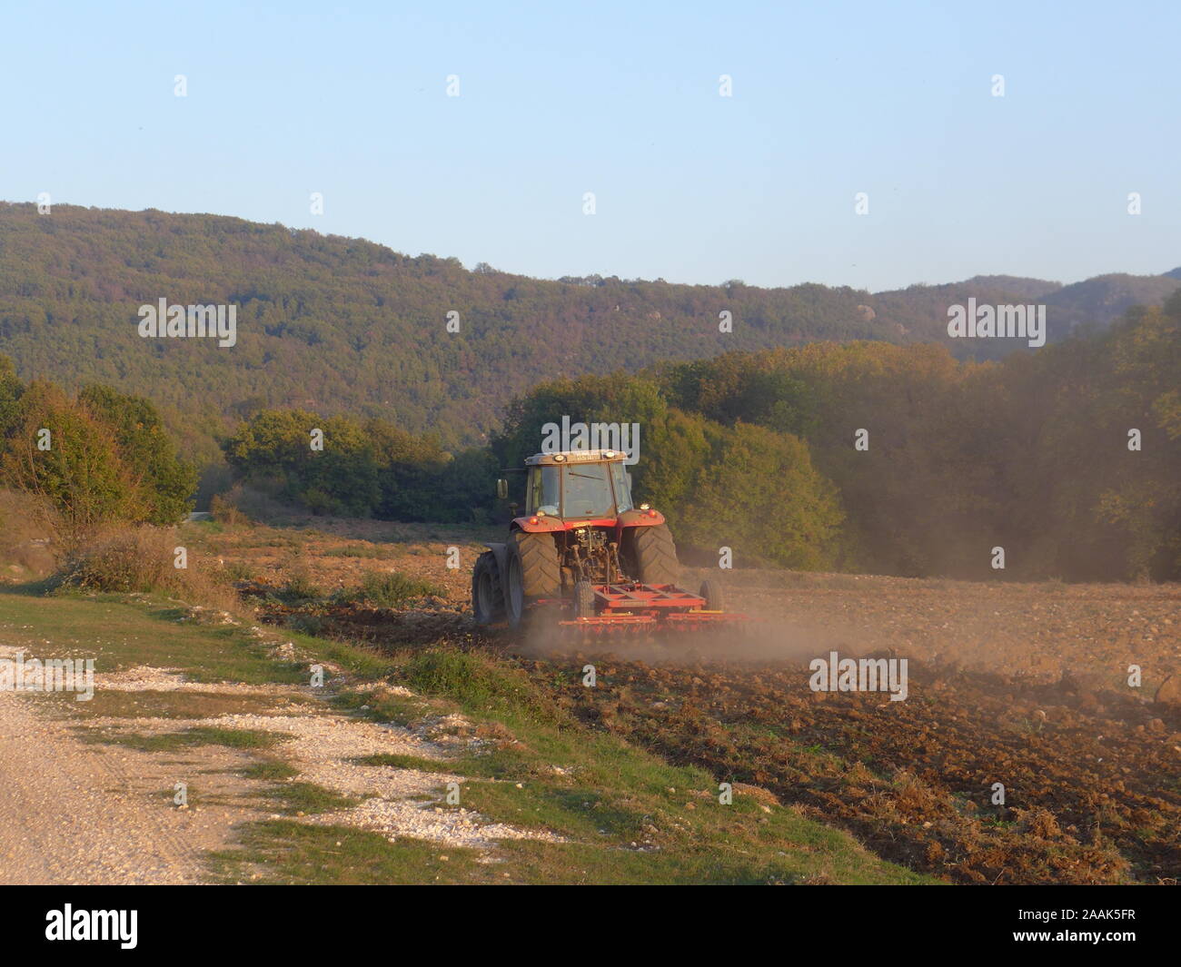 farming & plowing the soil in Chalkidiki, Greece Stock Photo - Alamy