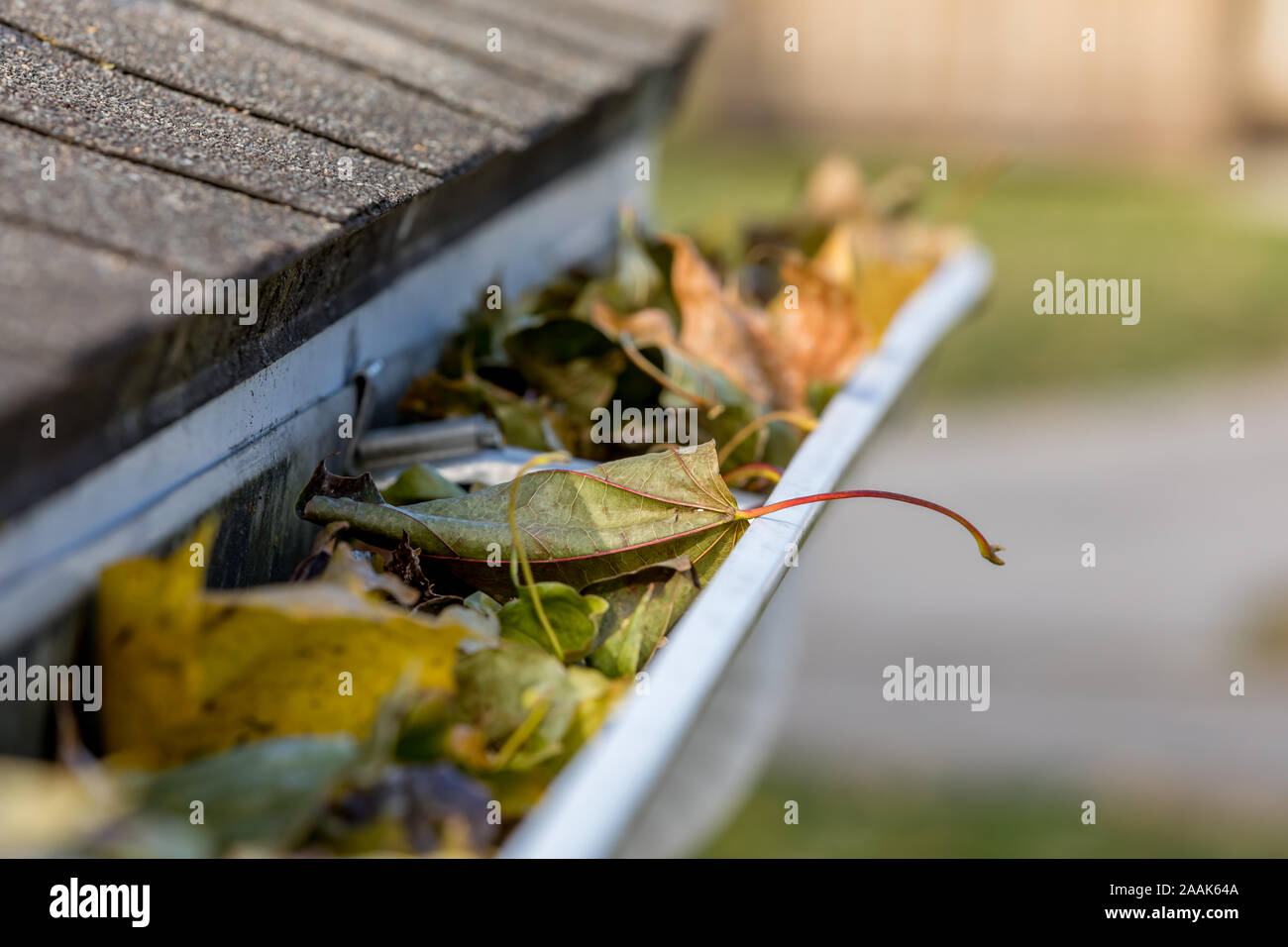 Rain falling from gutter hi-res stock photography and images - Alamy