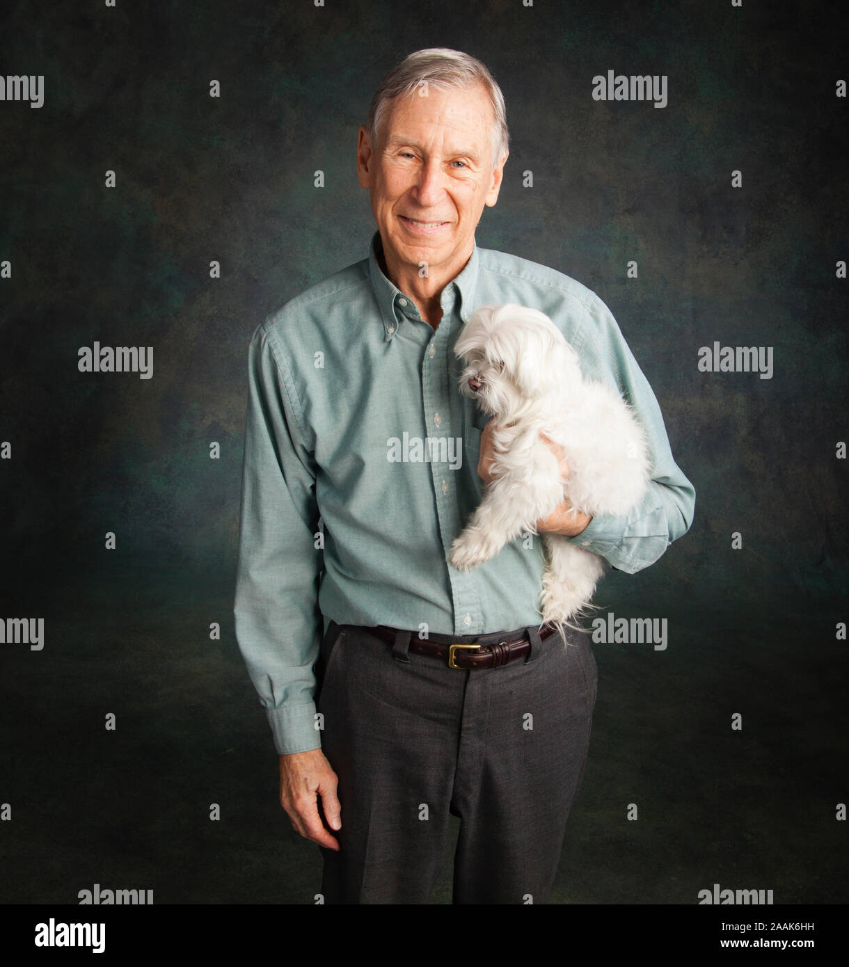 Man holding his dog hi-res stock photography and images - Alamy