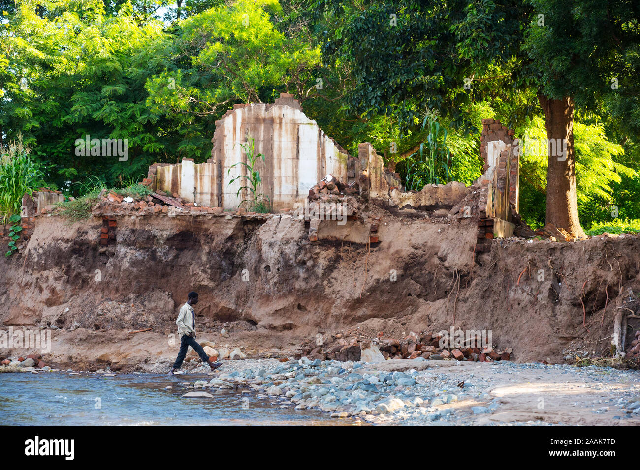 Riverbank erosion. A house destroyed on a tributary of the Shire River ...