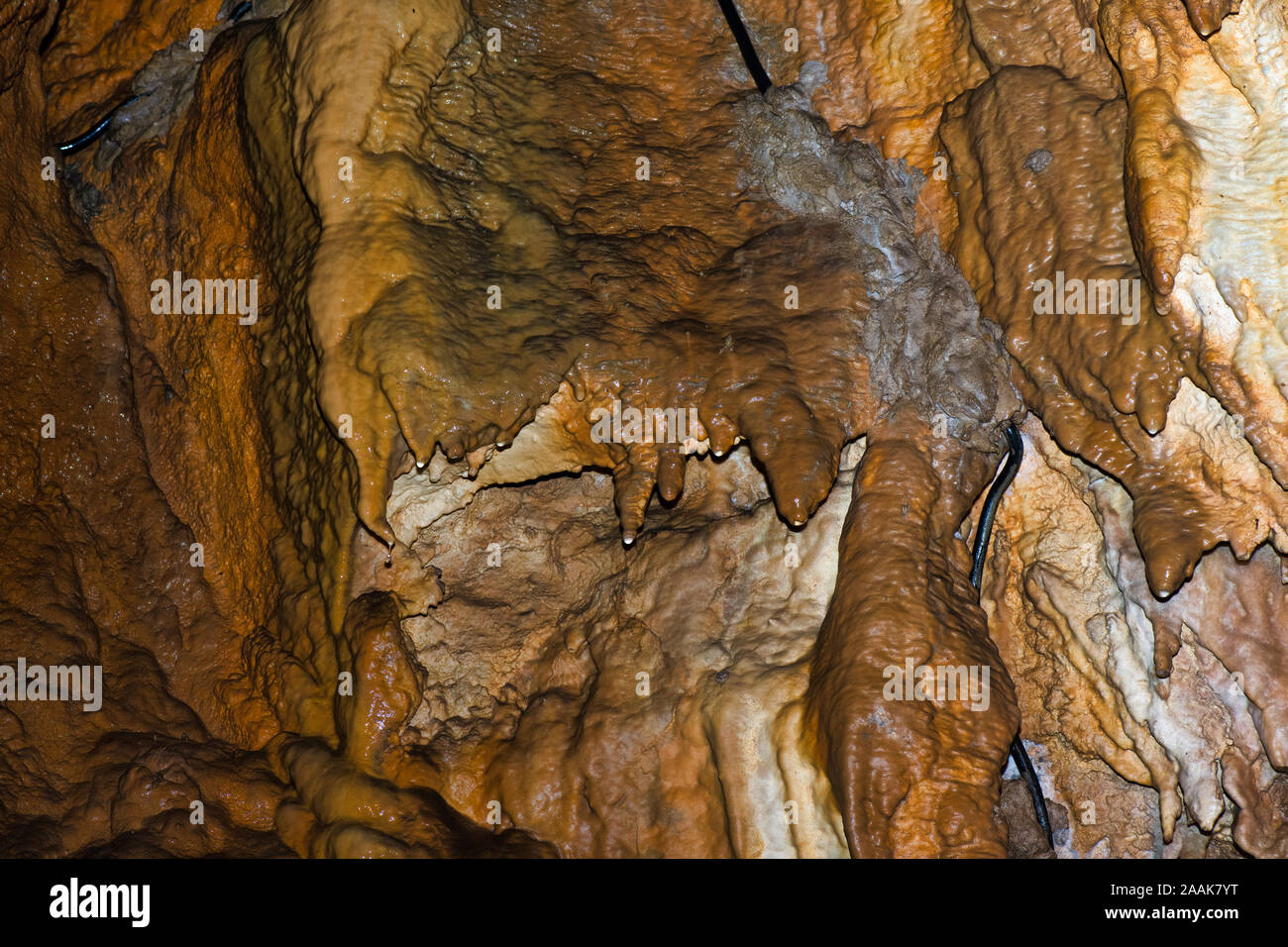 Inside a limestone cave during a speleological tourist visit Stock ...