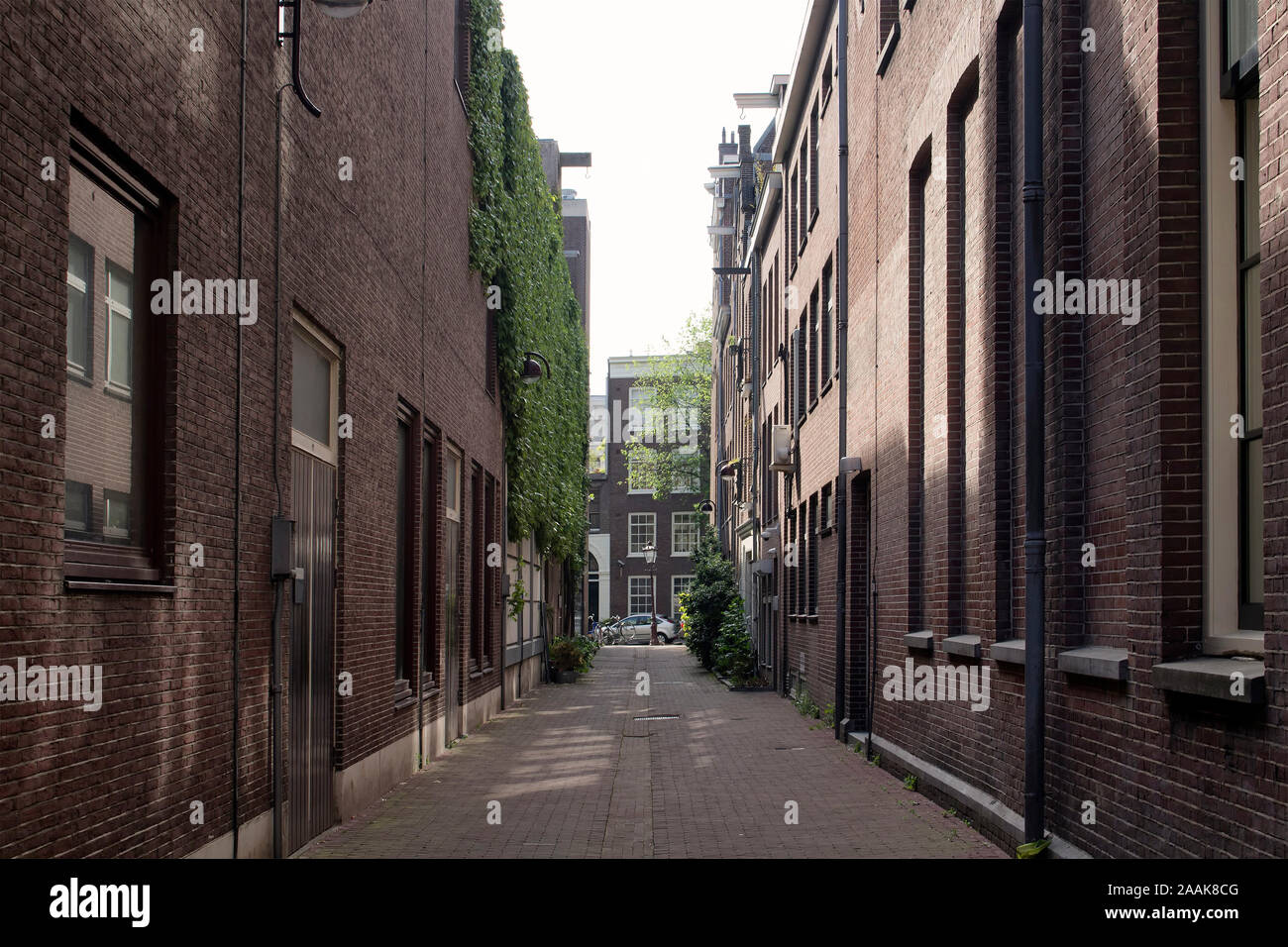 View of traditional, historical buildings with brick walls in Amsterdam ...