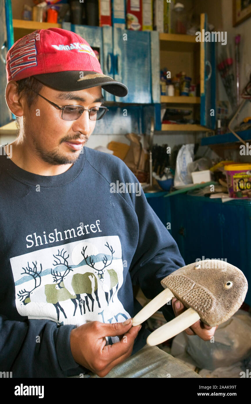 An Inuit man with traditional eskimo art on Shishmaref. A culture much ...