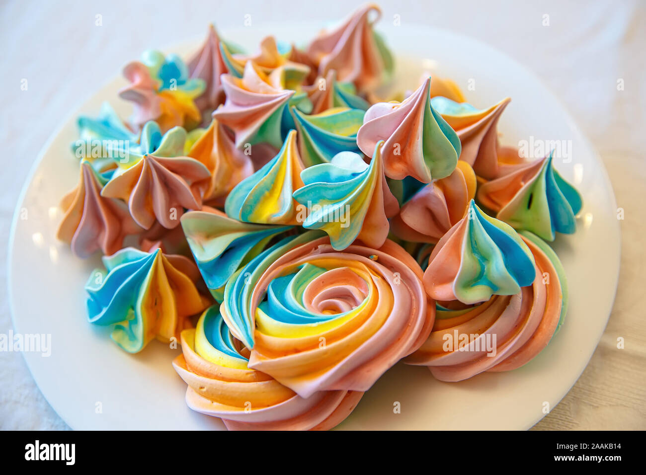 Sweet food. Charming homemade colorful meringues. Candy colored ...