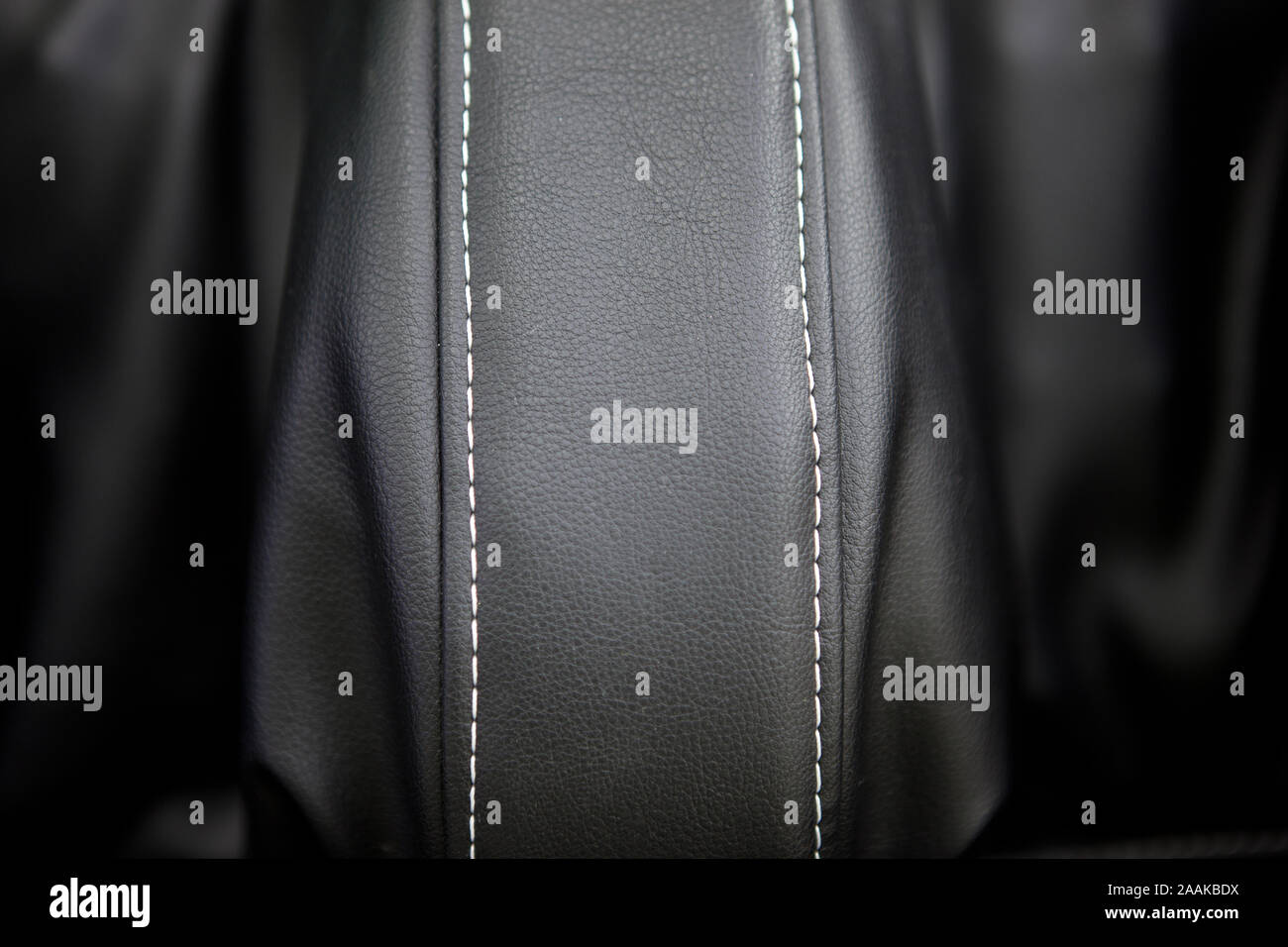 Modern luxury car leather interior. Part of leather car seat details ...