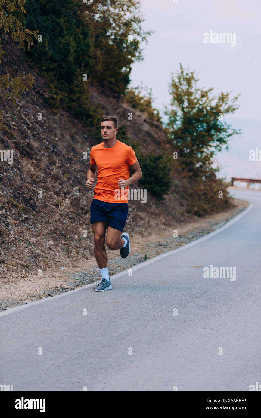 Man out running on forest hi-res stock photography and images - Alamy