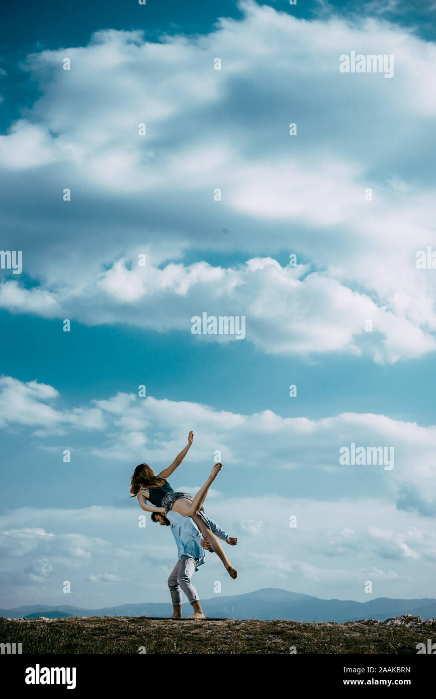 Sensual couple performing an artistical and emotional contemporary ...