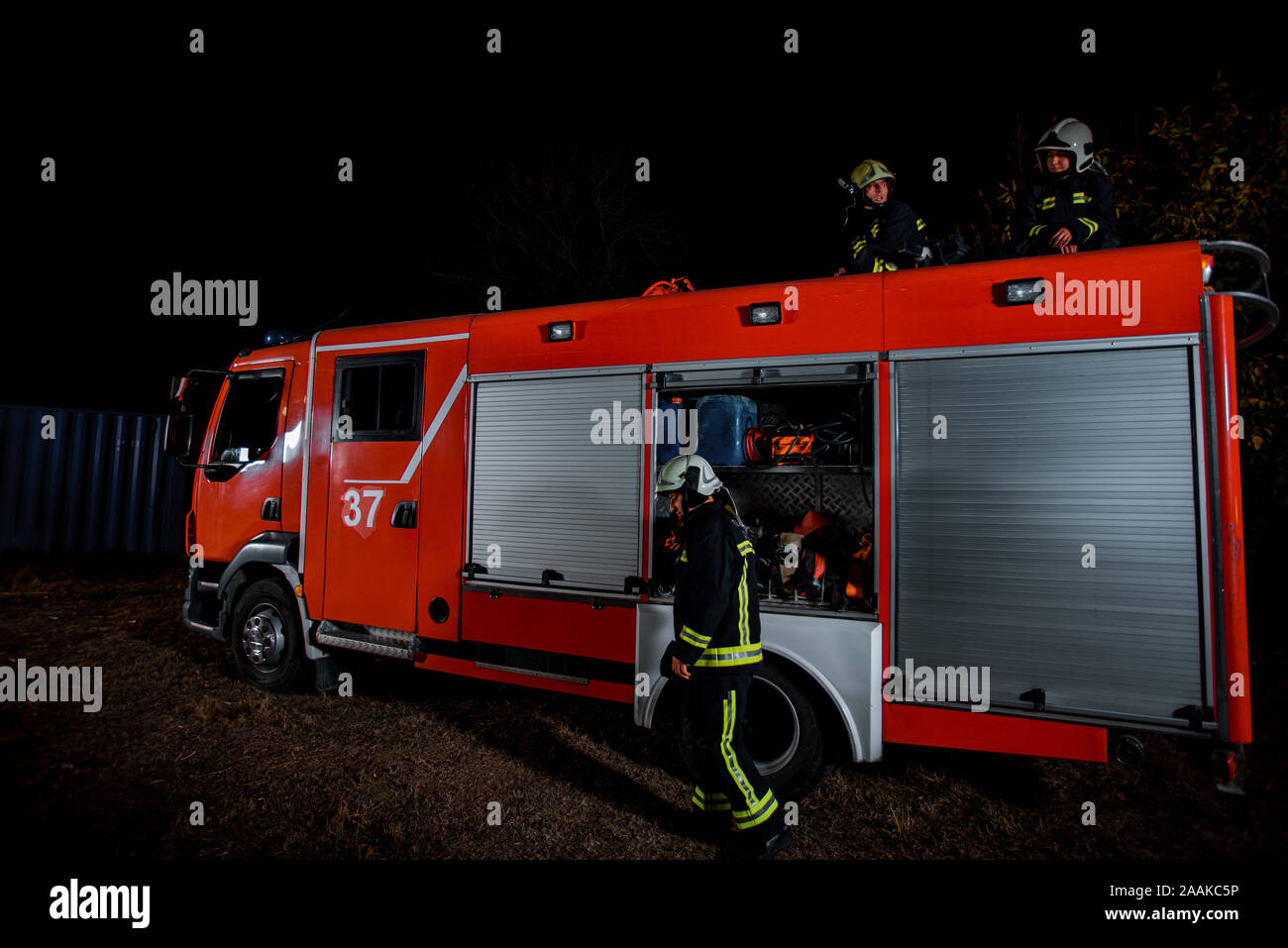 Fire station crew responding to fire emergency situation Stock Photo ...