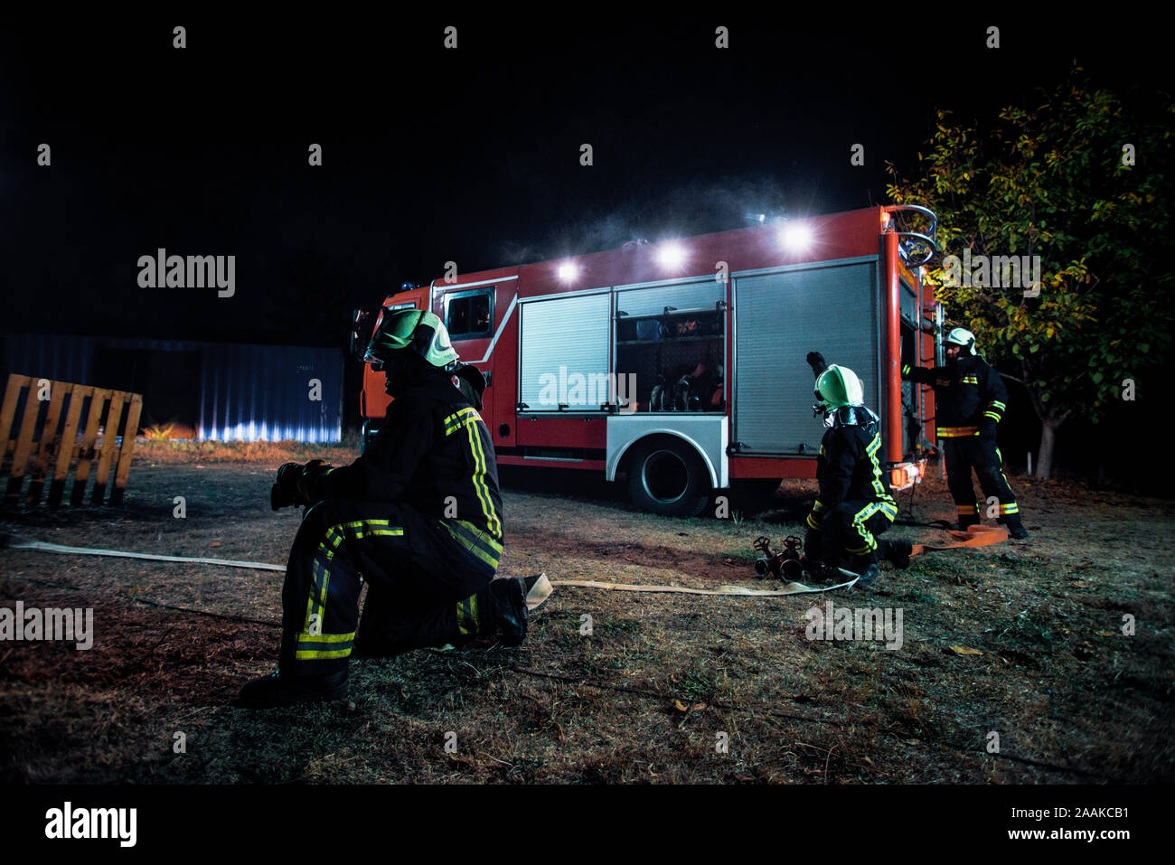 Fire station crew responding to fire emergency situation Stock Photo ...