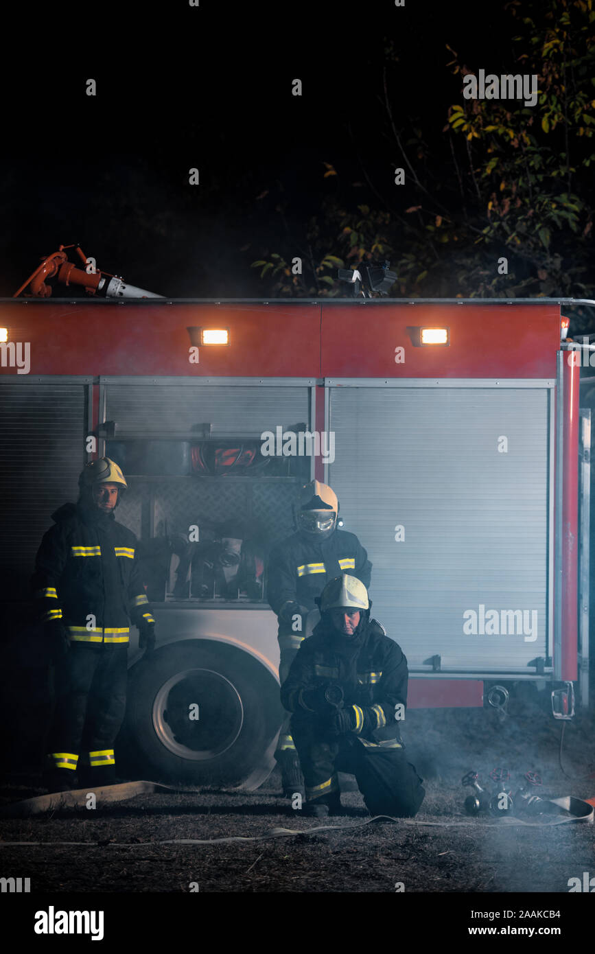 Fire department in the field during a fire emergency situation Stock ...