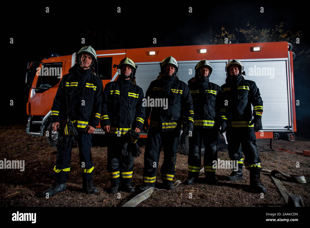 Fire station crew responding to fire emergency situation Stock Photo ...