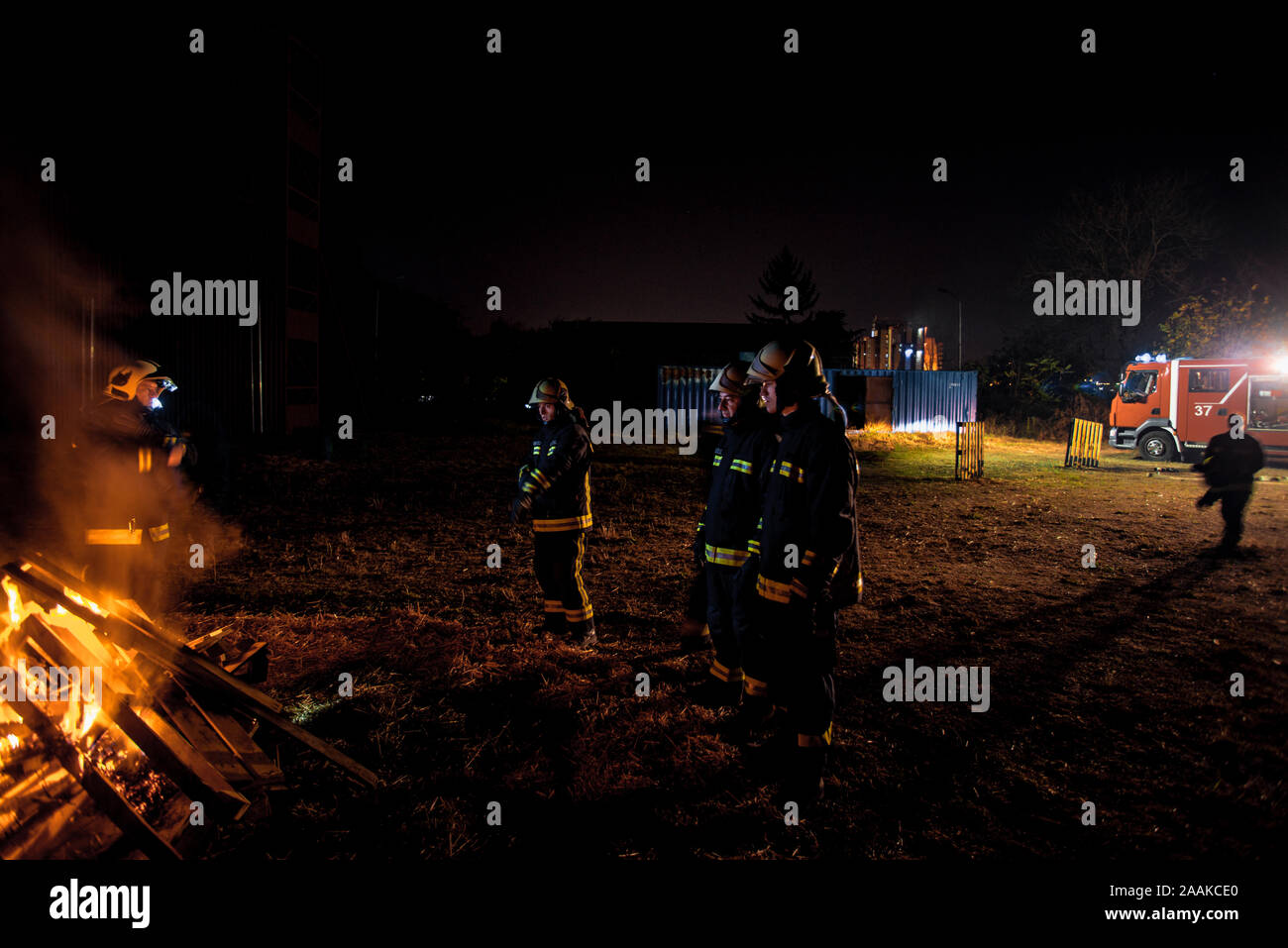 Fire station crew responding to fire emergency situation Stock Photo ...