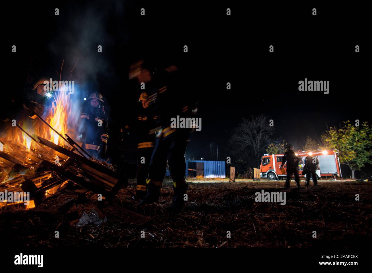 Fire department in the field during a fire emergency situation Stock ...
