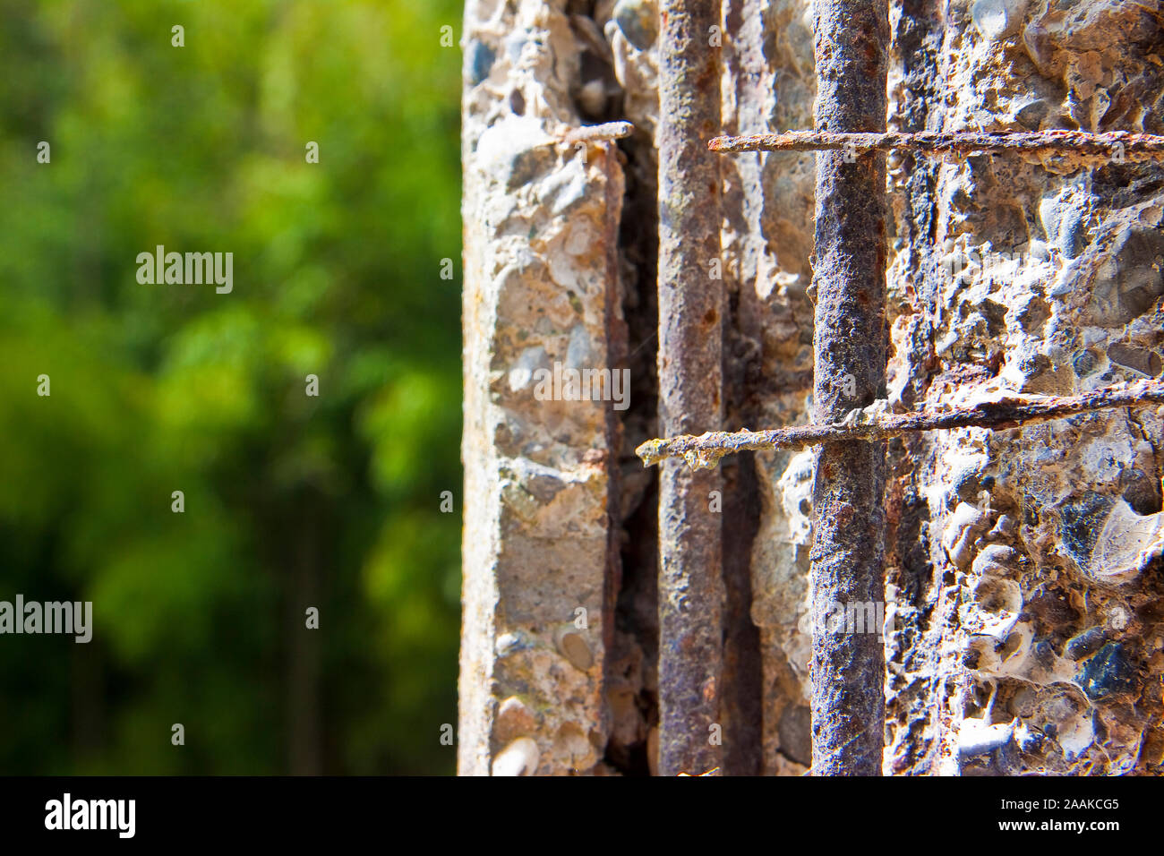 Danger cracked concrete electricity pylon in states of disrepair with ...