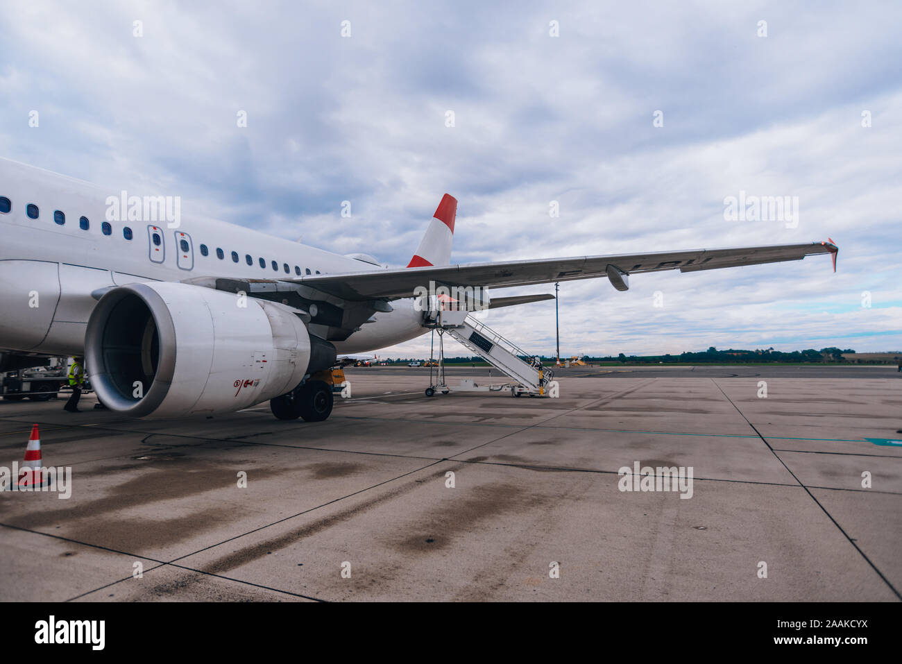 Jet propelled airplane during a boarding process at an aerodrome Stock ...