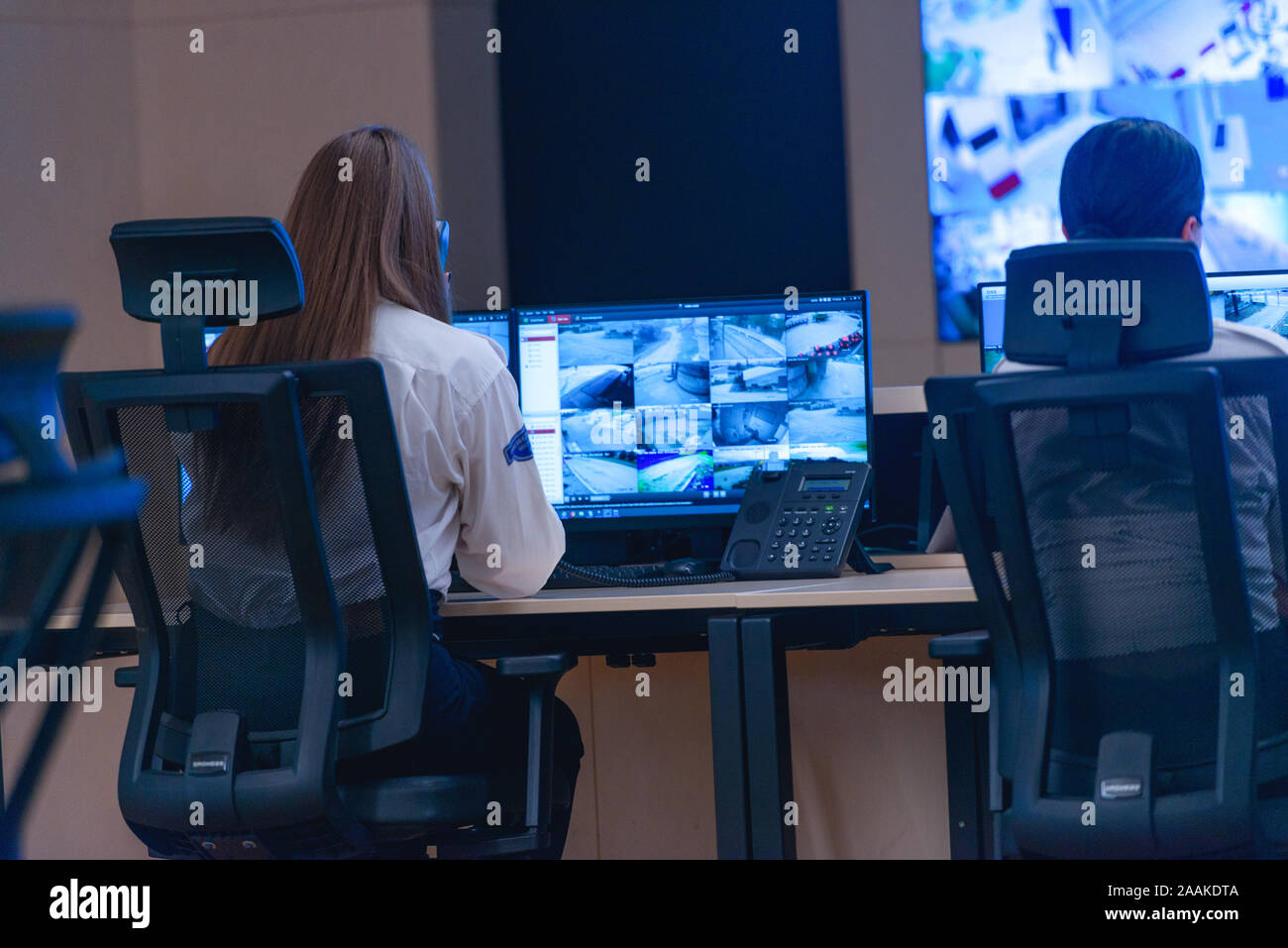 In the System Control Room, Technical Operator Works at His Workstation ...