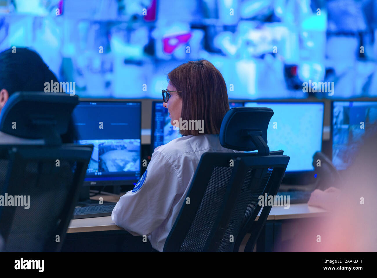 In the System Control Room, Technical Operator Works at His Workstation ...