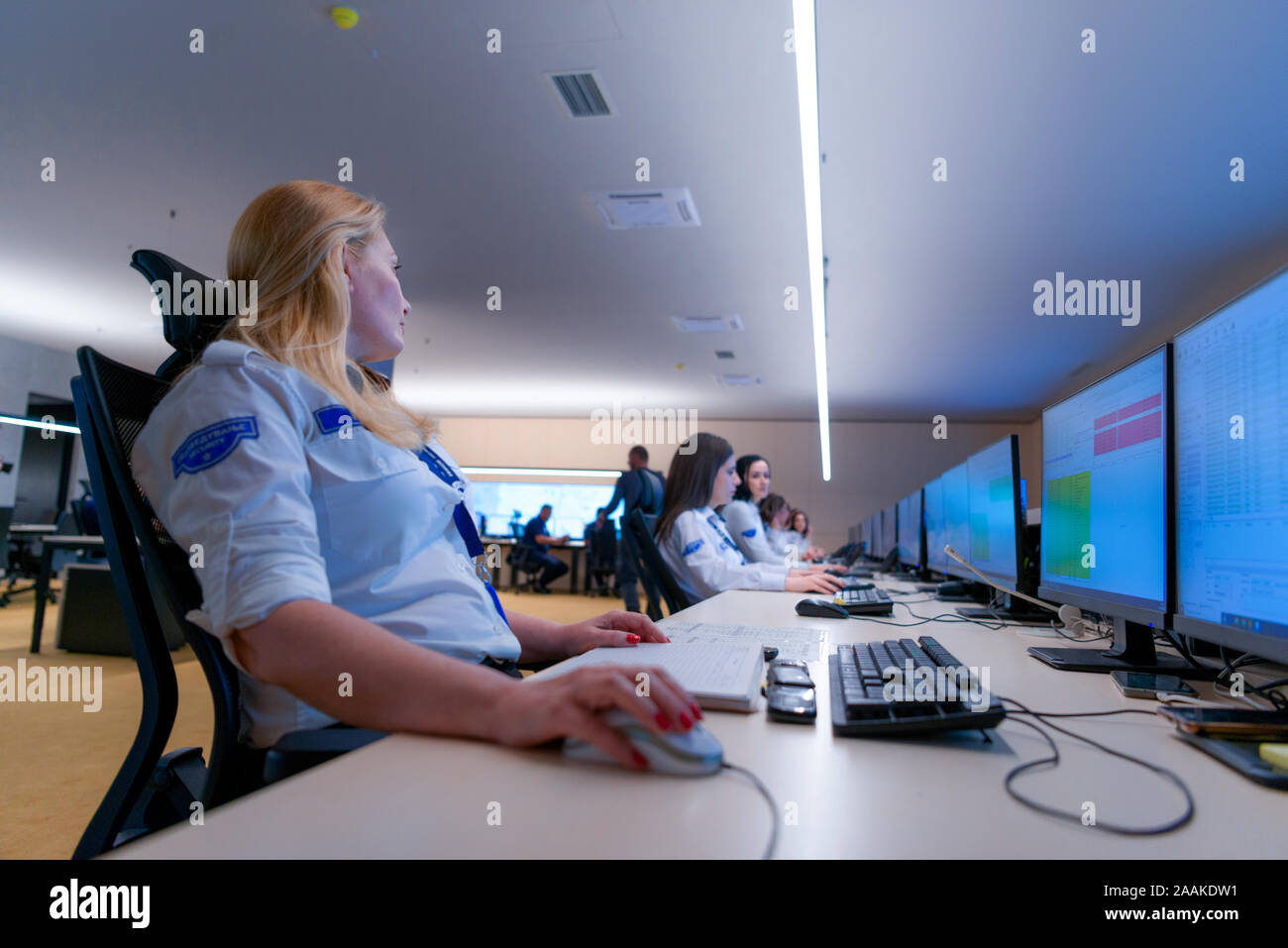 In the System Control Room, Technical Operator Works at His Workstation ...