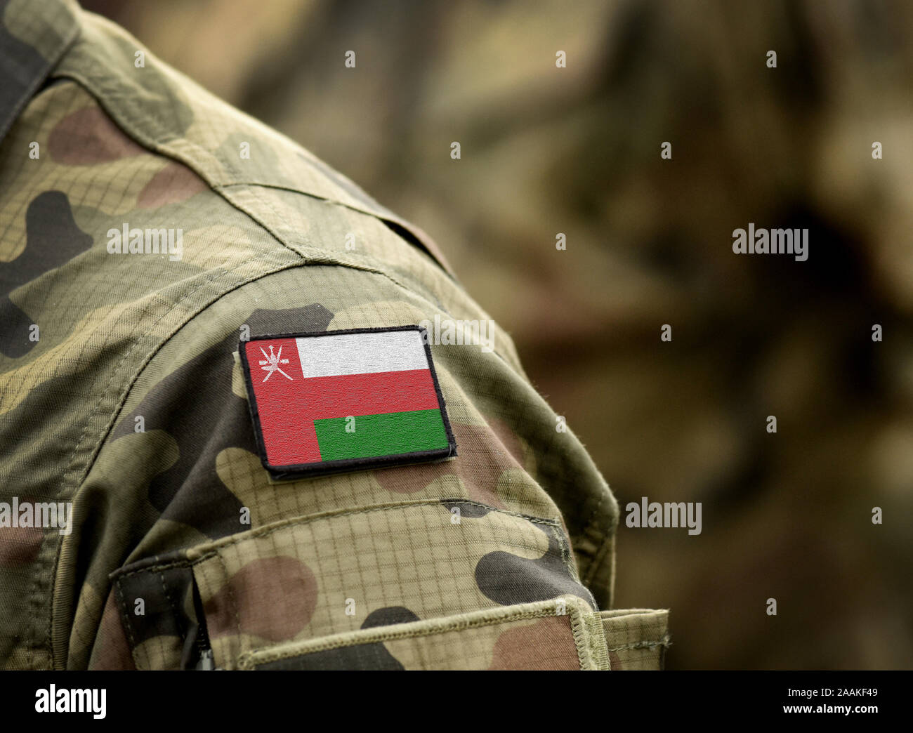 Flag of Oman on military uniform. Army, armed forces, soldiers. Collage ...