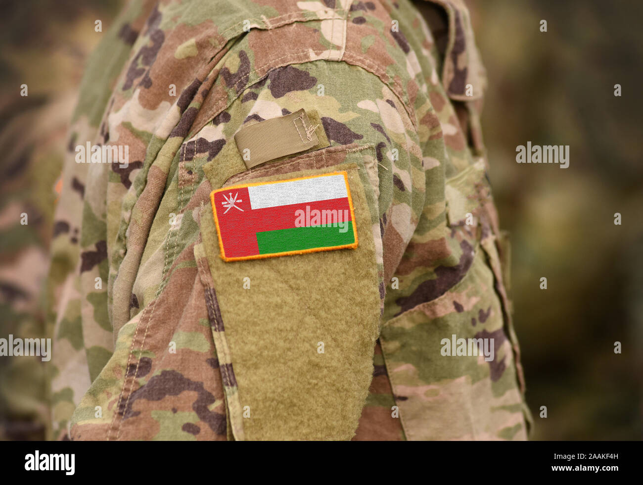 Flag of Oman on military uniform. Army, armed forces, soldiers. Collage ...