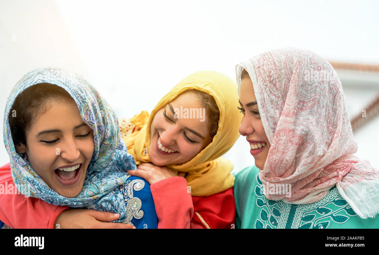 Happy arabian women having fun in the city - Young muslim girls ...