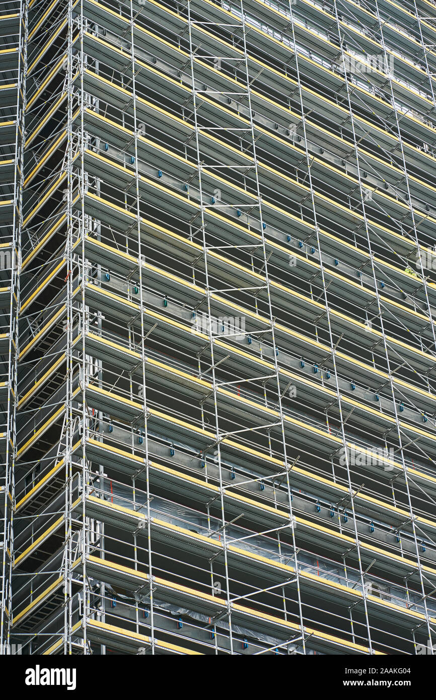Scaffolding erected during the construction of a skyscraper in Poznan ...