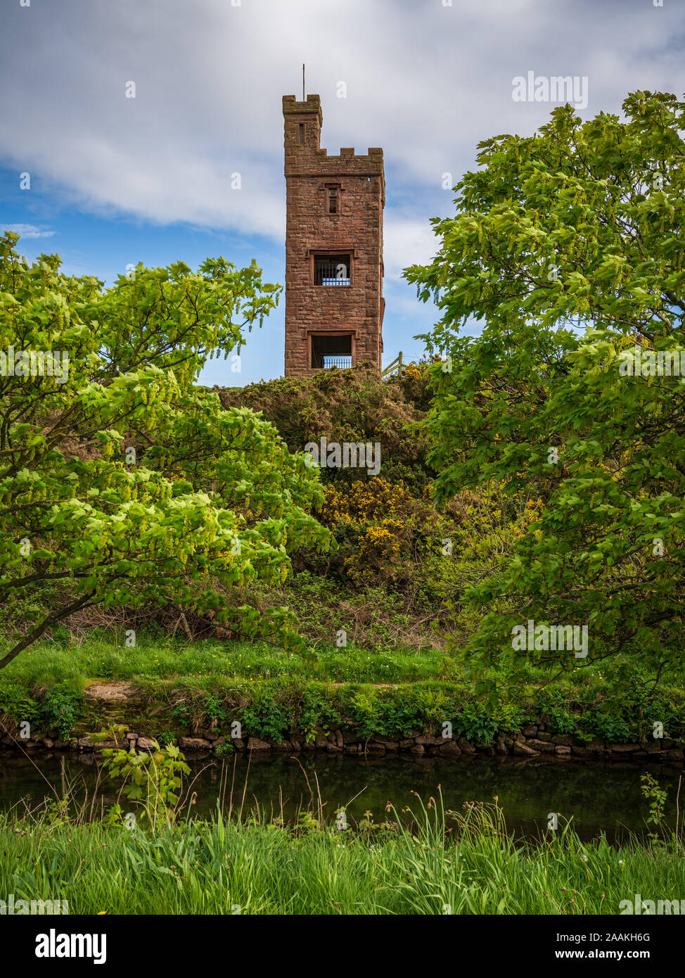The Braystones Tower and the River Ehen in Braystones, Cumbria, England ...