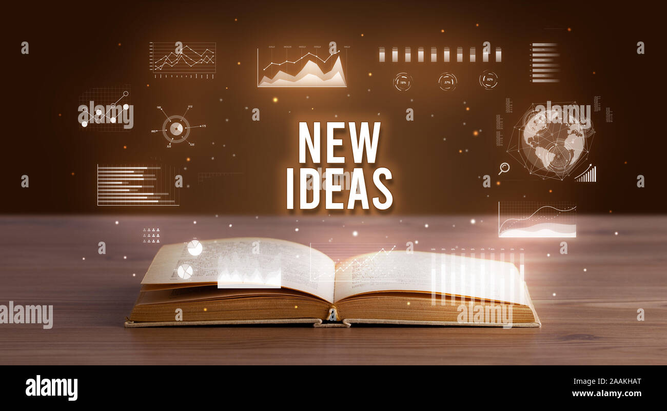 NEW IDEAS inscription coming out from an open book, creative business ...
