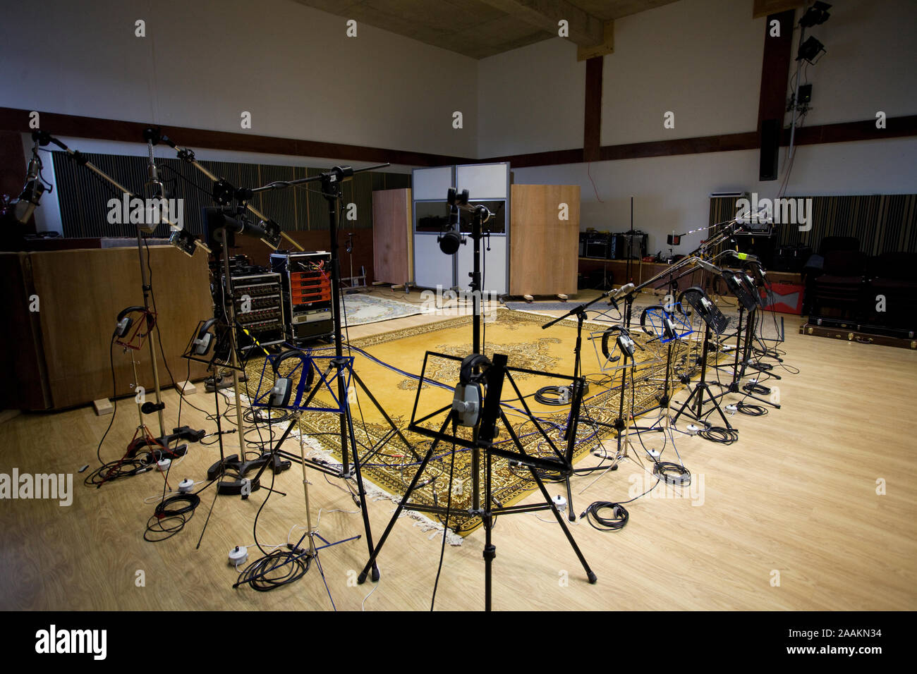 Microphone set up in empty recording studio Stock Photo - Alamy