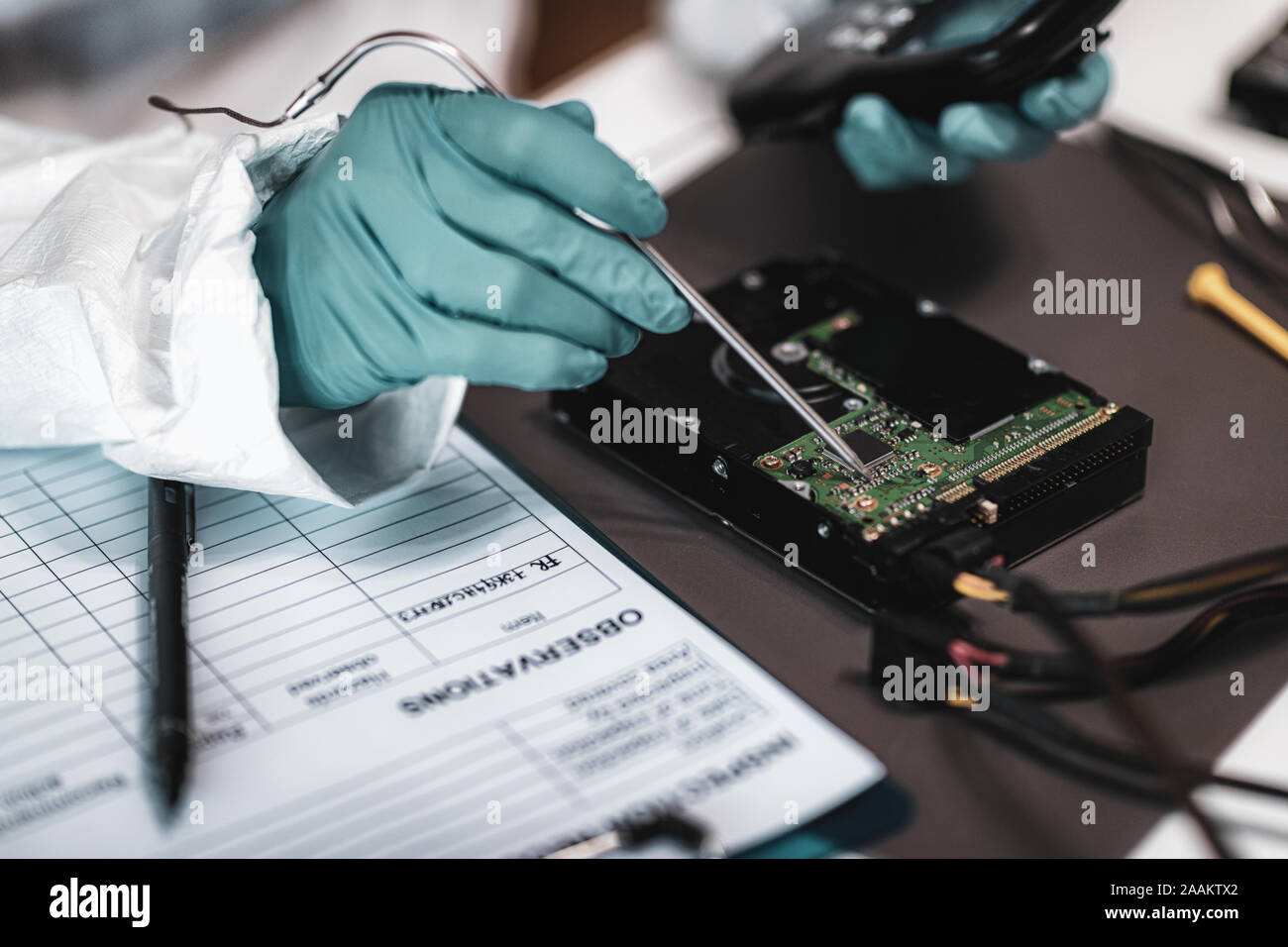 Forensic expert working in forensic science laboratory Stock Photo - Alamy