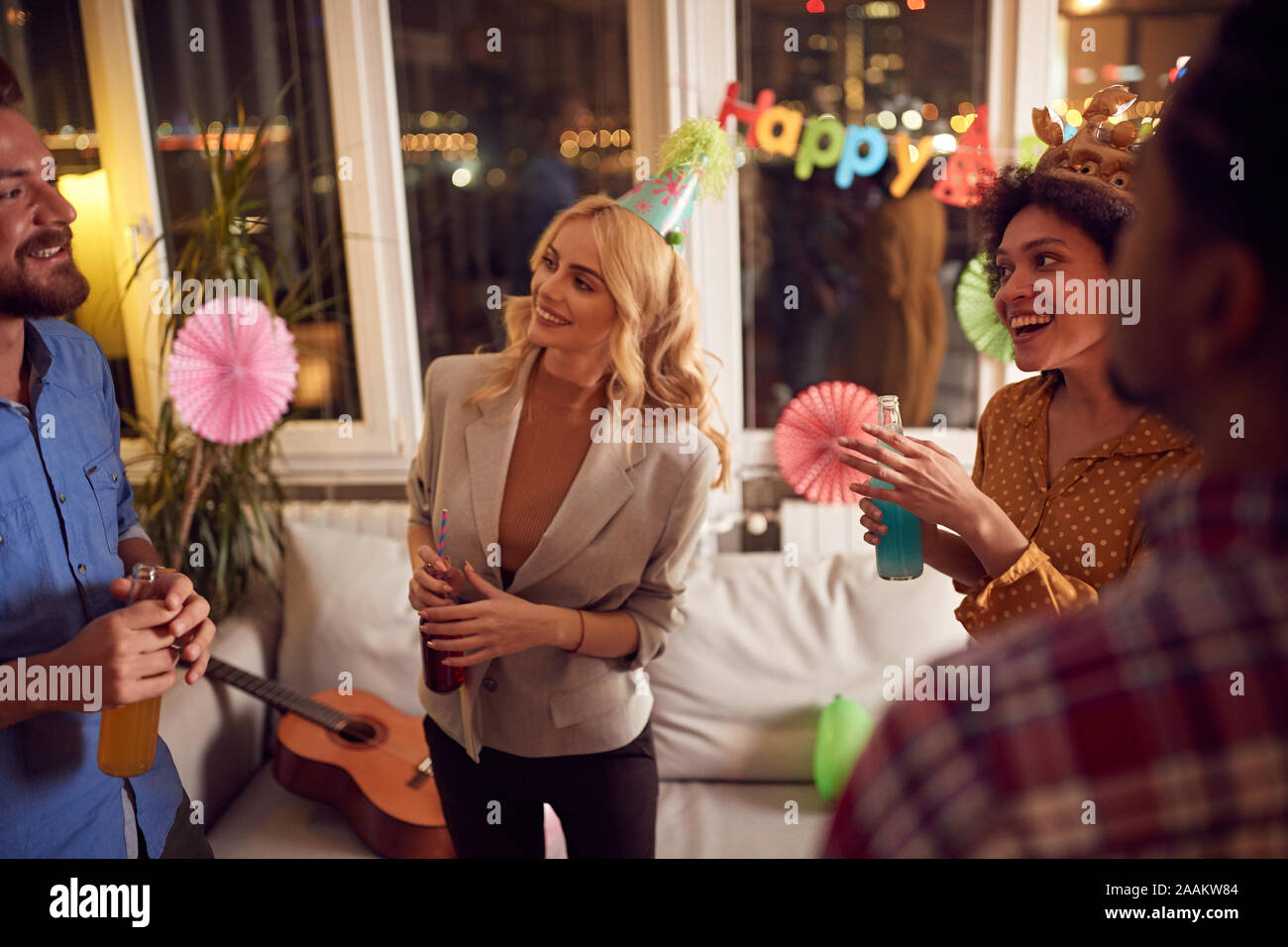 Happy Friends enjoying in birthday party together Stock Photo - Alamy