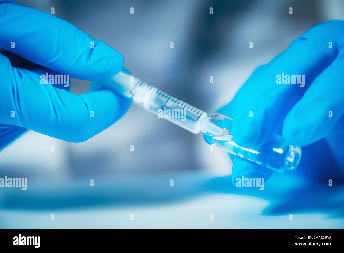 Medical professional administering a flu vaccine injection Stock Photo ...