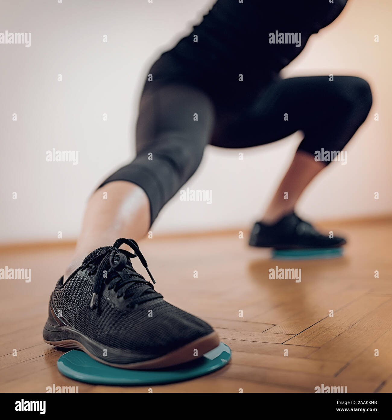 Woman exercise disc gliding hi-res stock photography and images - Alamy
