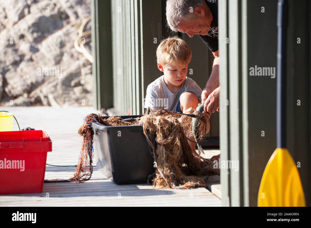 Child grandparent fishing hi-res stock photography and images - Alamy