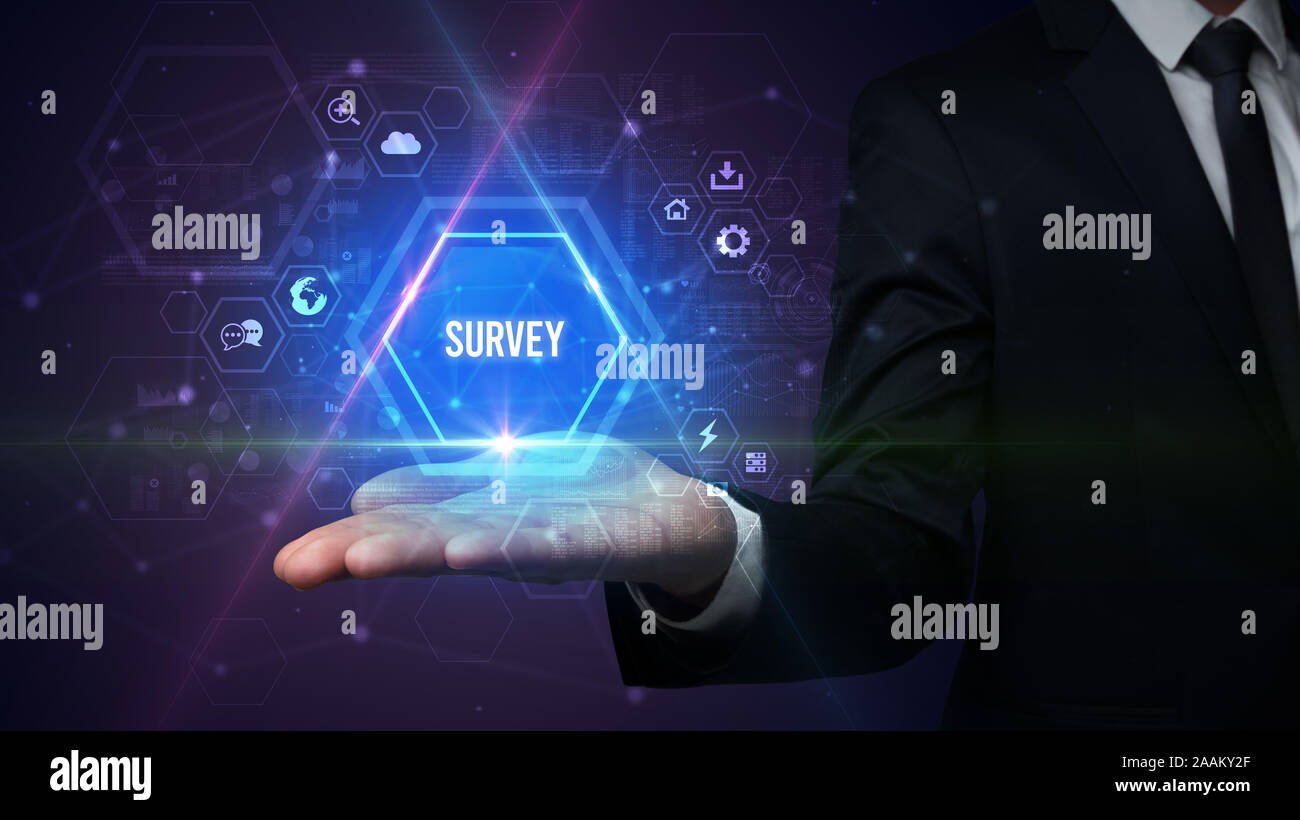 Man hand holding SURVEY inscription, social media concept Stock Photo ...