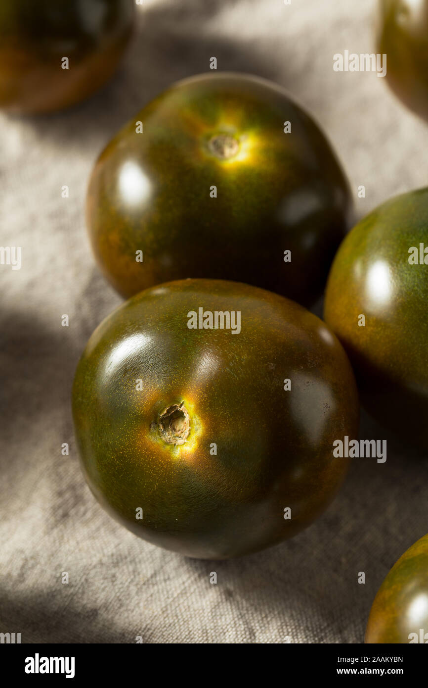 Raw Brown Organic Kumato Tomatoes Ready to Eat Stock Photo - Alamy