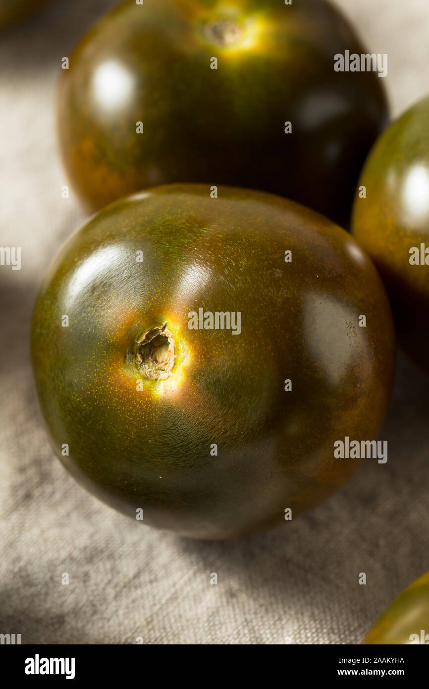 Raw Brown Organic Kumato Tomatoes Ready to Eat Stock Photo - Alamy