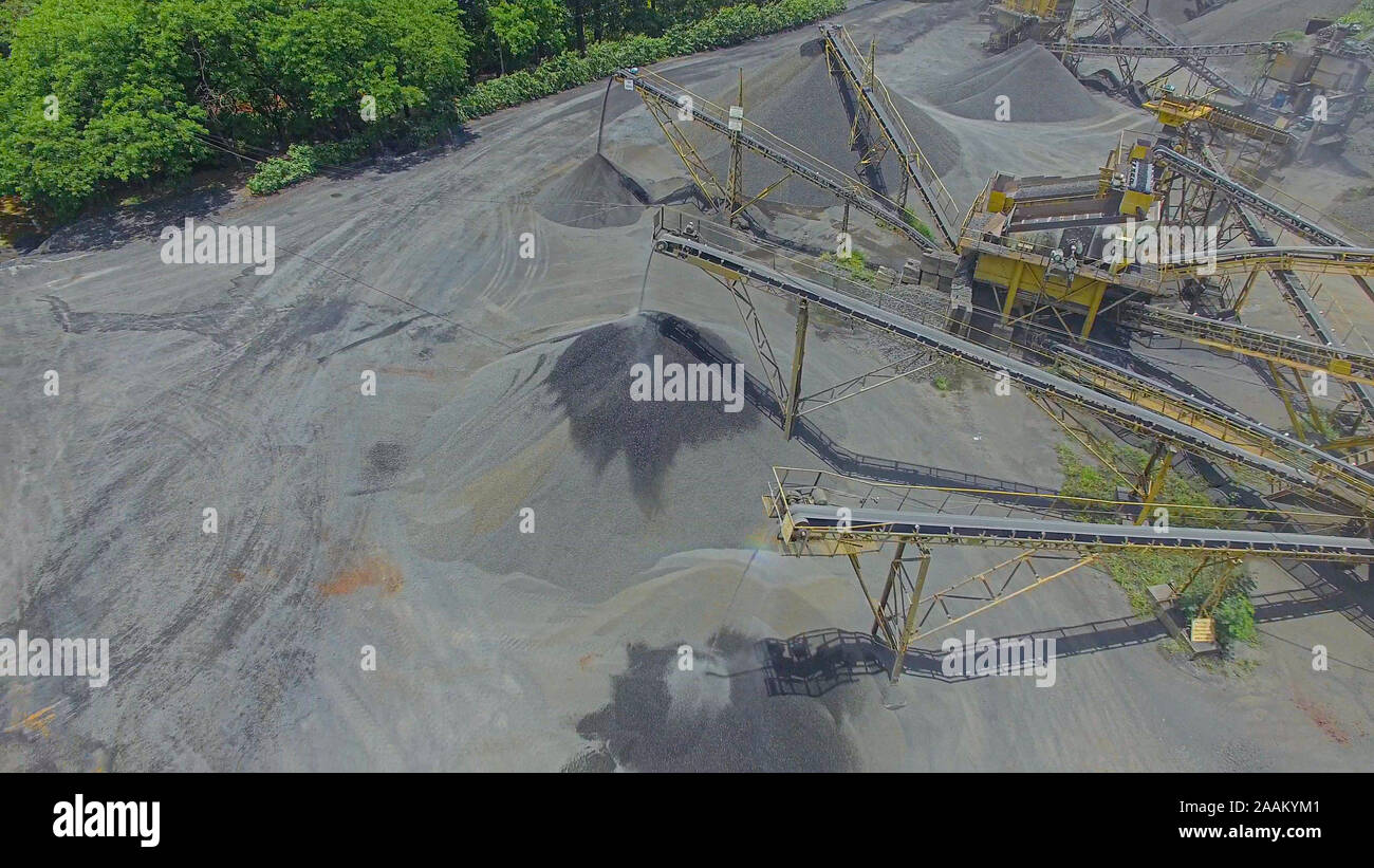 conveyor belt mine line rock transport Stock Photo - Alamy