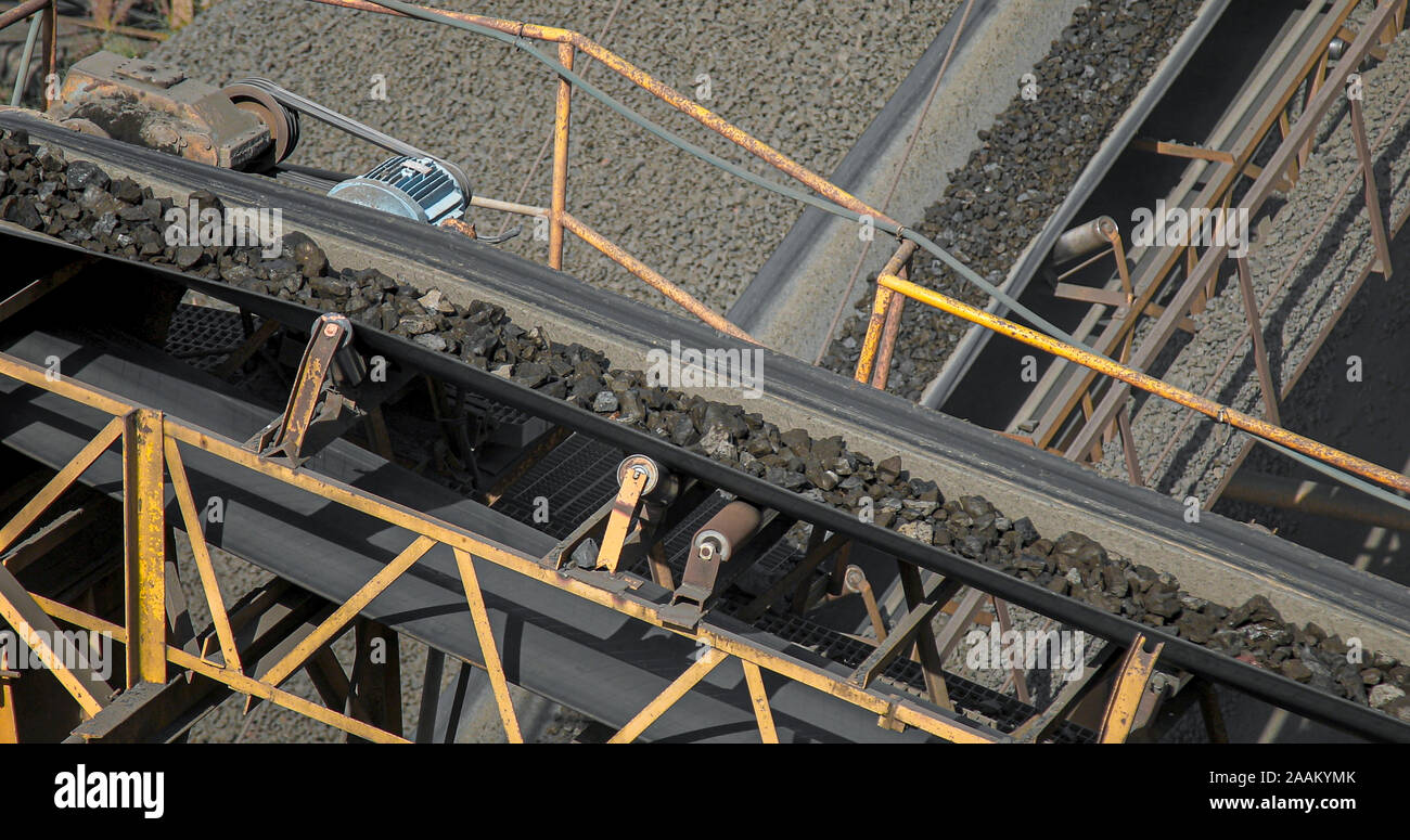 conveyor belt mine line rock transport Stock Photo - Alamy
