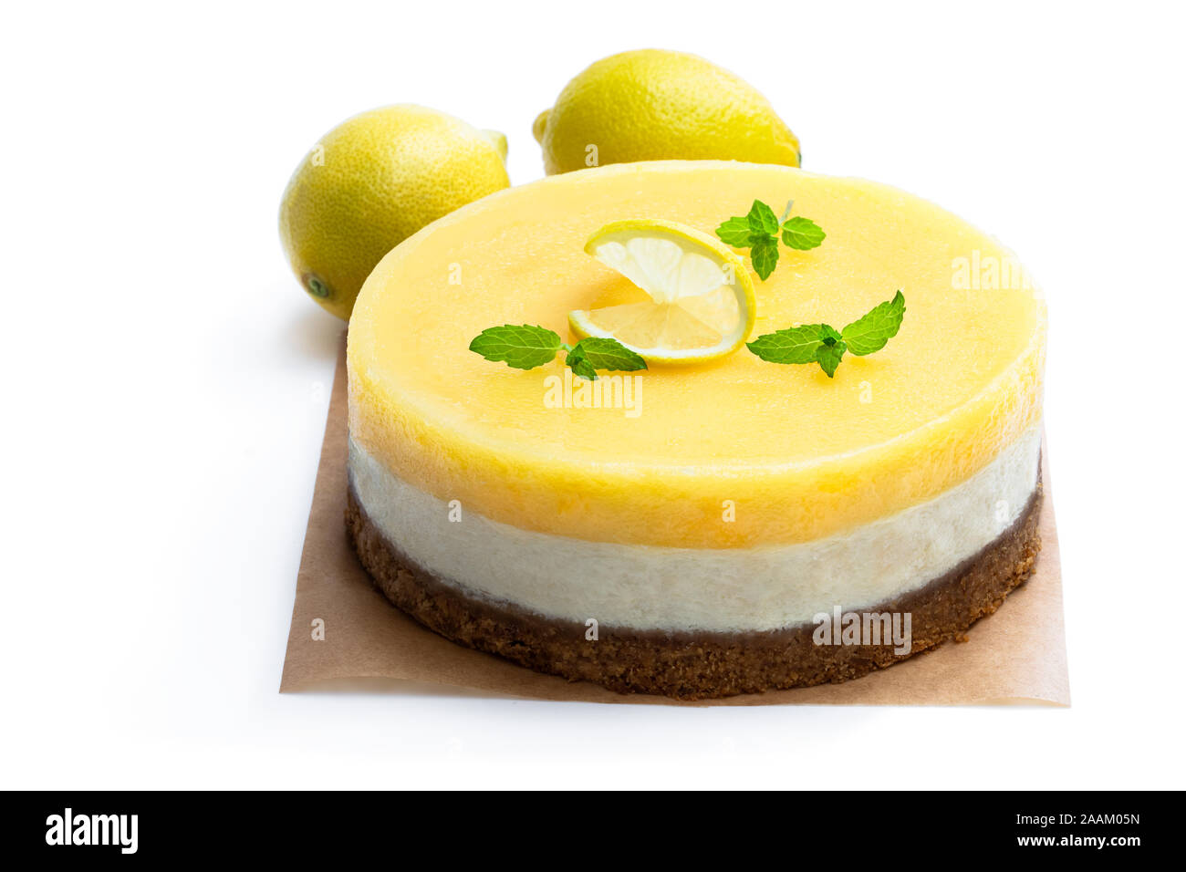 Homemade Layered Lemon Cheesecake isolated on white Stock Photo - Alamy